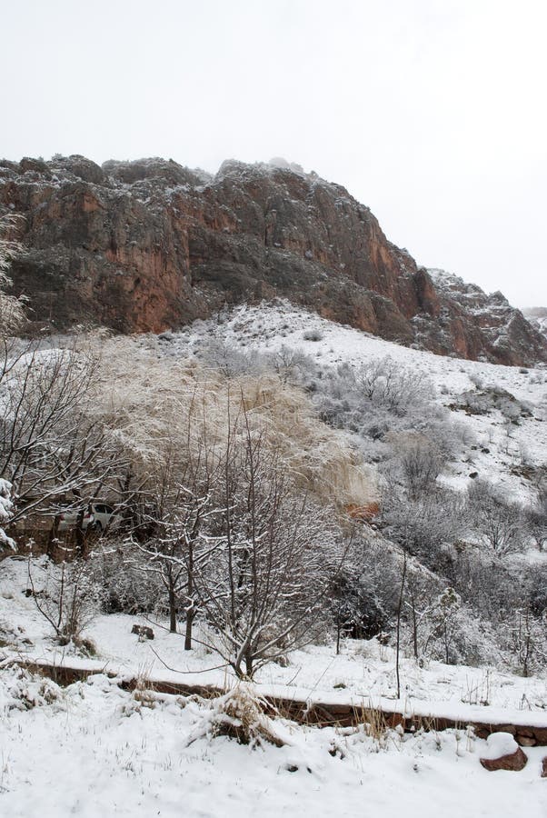 Mountains Under the Snow, Landscape with Red Rocks Stock Photo - Image ...