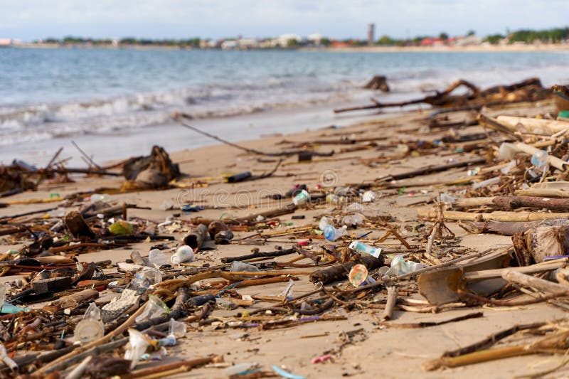 Mountains of Waste and Garbage on the Sandy Beach after the Tide ...