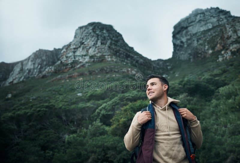 The Mountains Whisper for Me To Wander. a Young Man Hiking through the ...