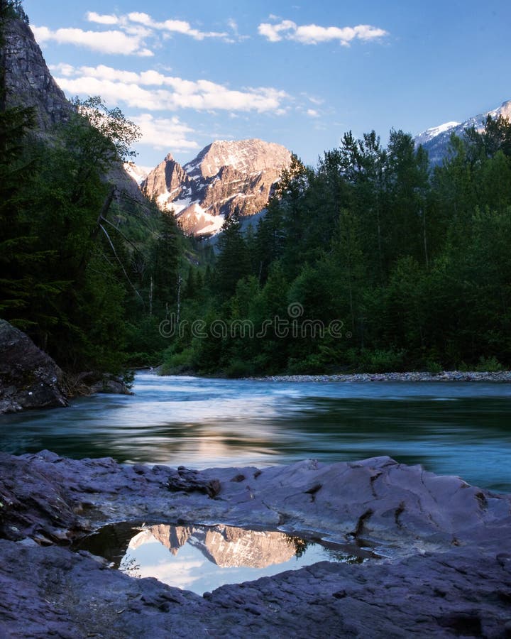 Mountaintop Reflection stock image. Image of rockies - 79773843