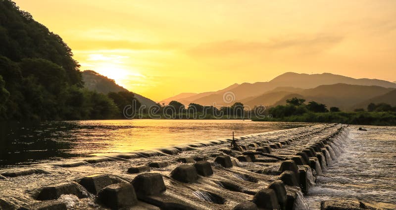 Mountian,water,sunset stock image. Image of sunlight - 112224573