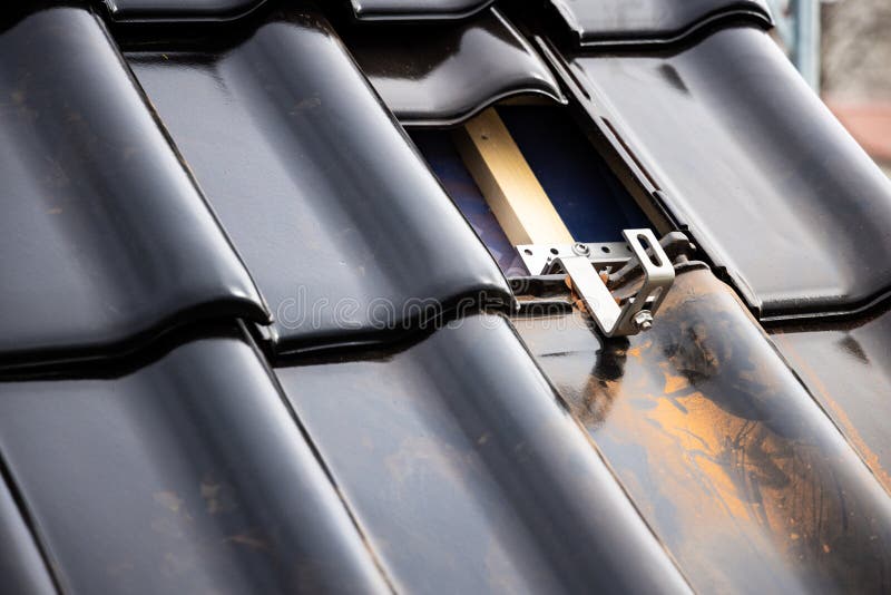 Mounting Bracket for Solar Panels on a Tile Roof Stock Image - Image of ...