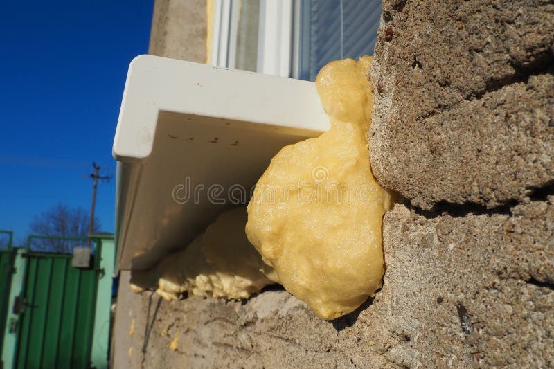 Mounting Foam Under the Window Sill.DIY Concept. Construction PU - Poly ...
