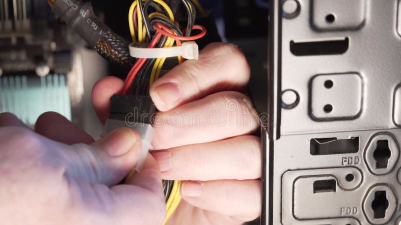 Power cable in the PC stock video. Video of technician - 243888485