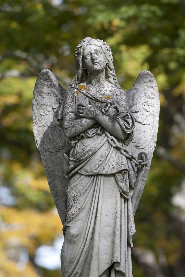 Mournful Statue of Chained Angel Stock Image - Image of robed, monument ...