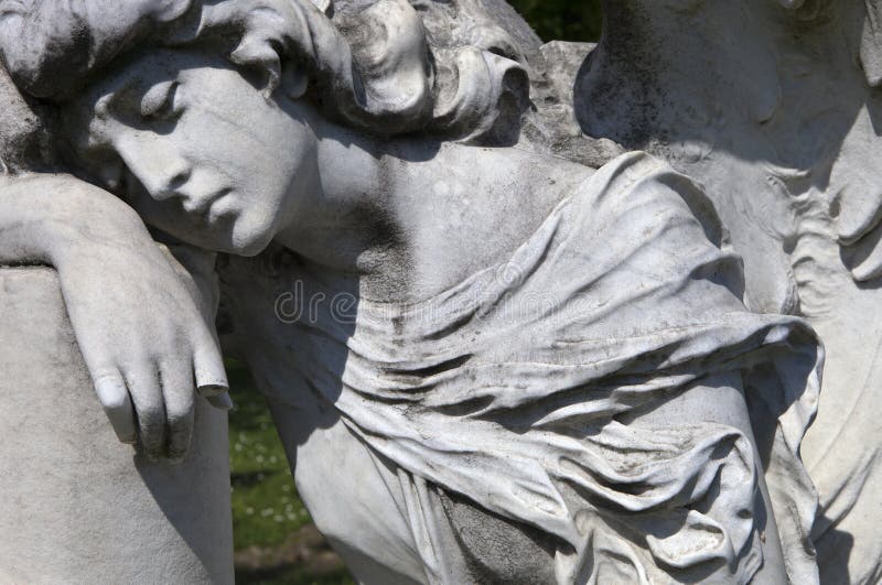 Mourning Angel Sitting on Mausoleum on Cemetery Cimitero Monumentale ...