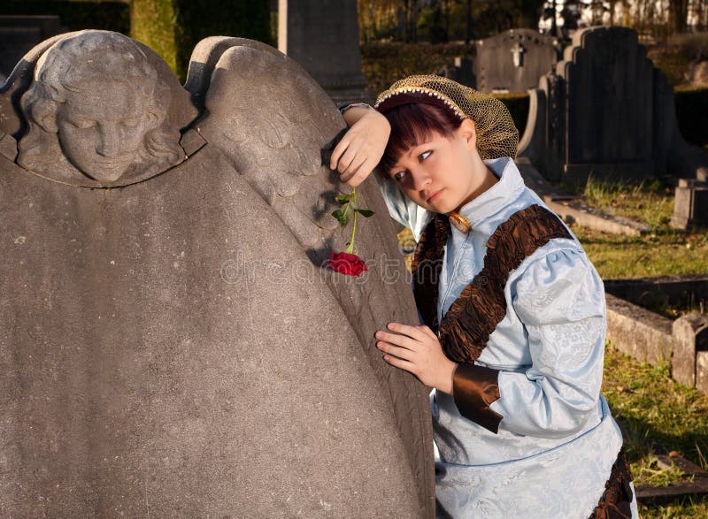 Crying in a graveyard stock photo. Image of tomb, hopeless - 26803394