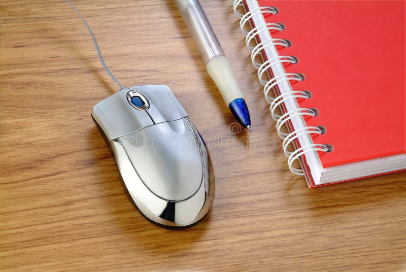 Mouse and note pad stock photo. Image of mouse, working - 1470972