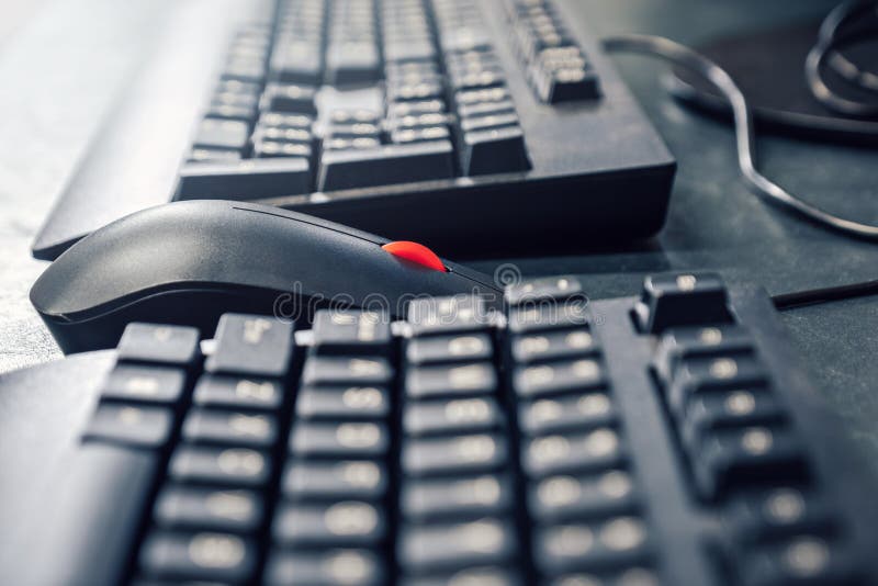 Mouse with Scrolling Wheel between Keyboards Stock Photo - Image of ... Mouse with Scrolling Wheel between Keyboards Stock Photo - Image of ...