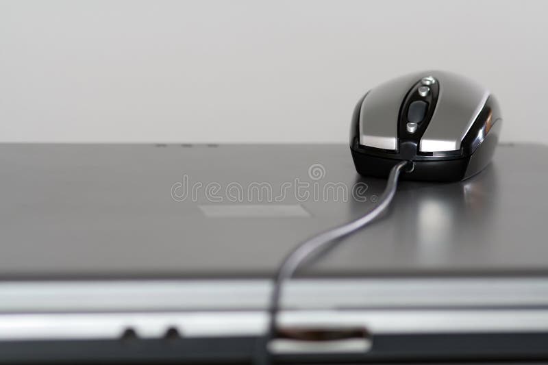 Mouse on a silver laptop stock photo. Image of focus, optics - 982088