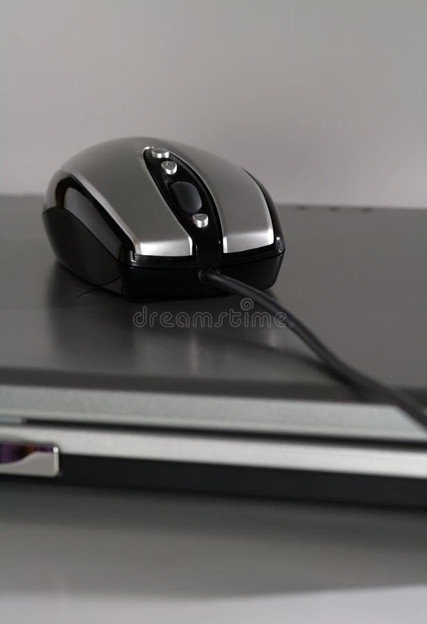 Mouse on a silver laptop stock image. Image of home, operation - 989461