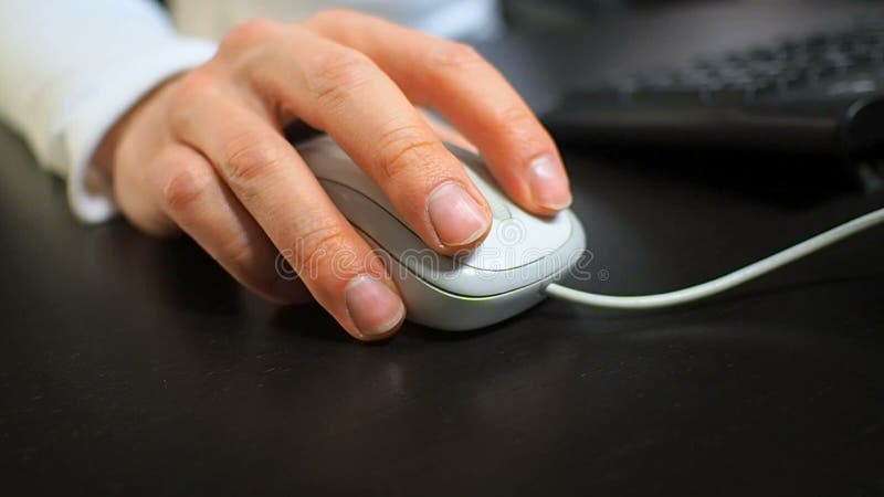 Mouse 11 Soft Focus To Hand Of The Man Clicking Left Mouse Button