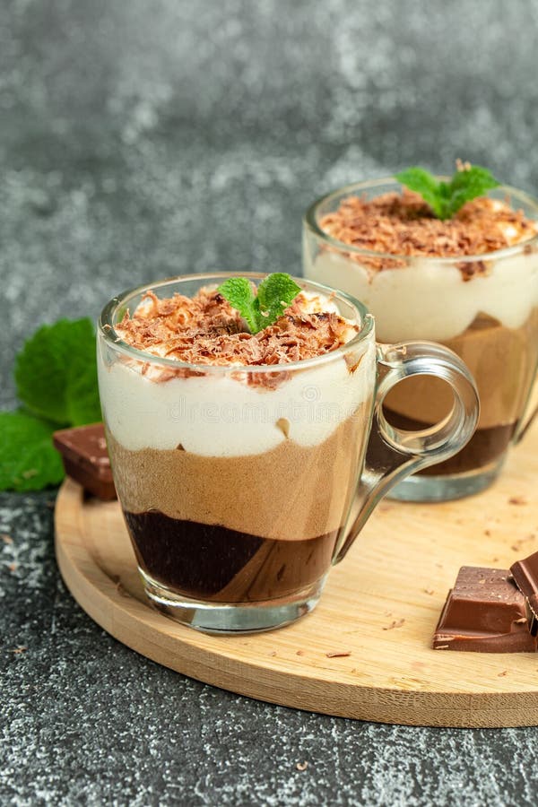 Mousse Three Chocolates in a Glass Decorated with Mint. Layered ...