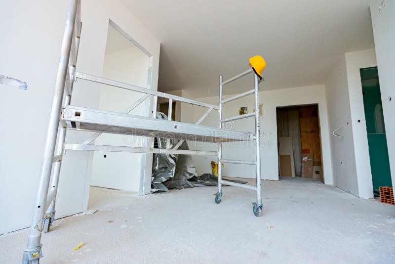 Moveable Scaffold with Wheels in the Building Under Construction ...