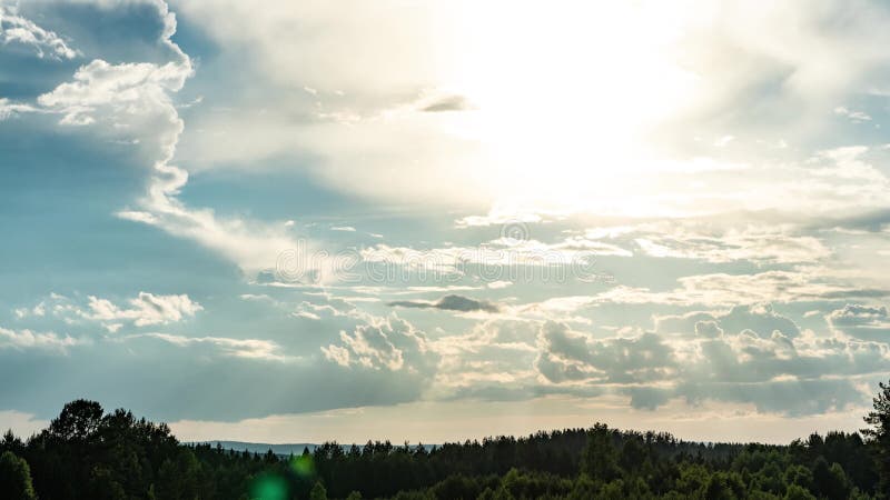The Movement of Clouds in the Sun. Timelapse Ray Light and Clouds on ...