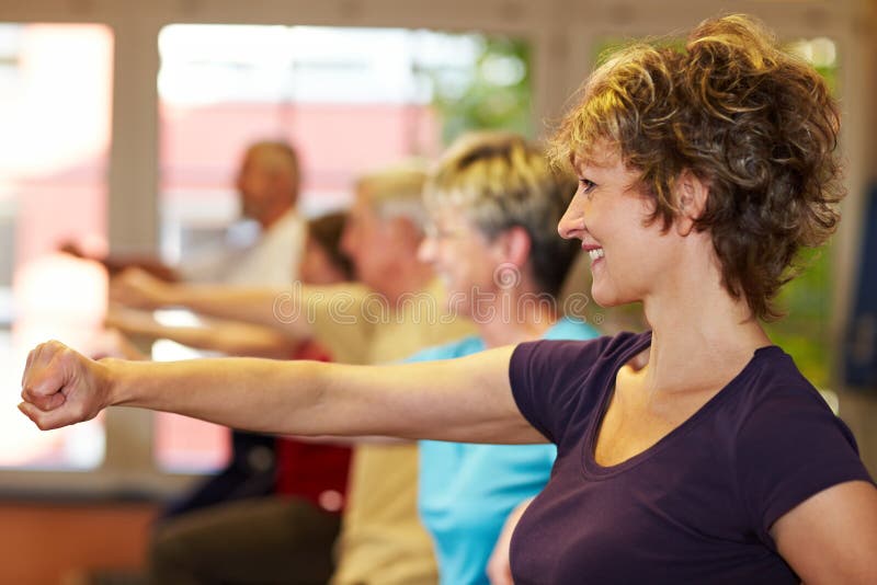 Movement exercises in gym stock image. Image of club - 17451449