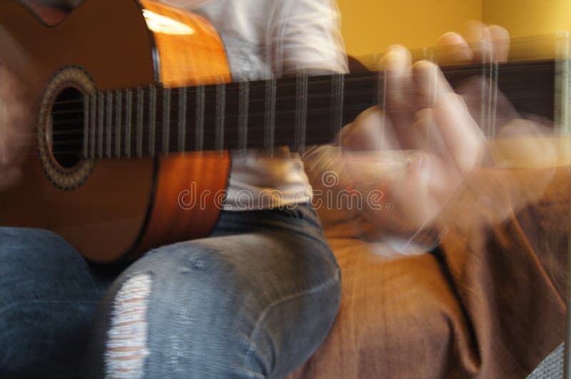 The Movement of a Playing Guitar Stock Photo - Image of movement ...