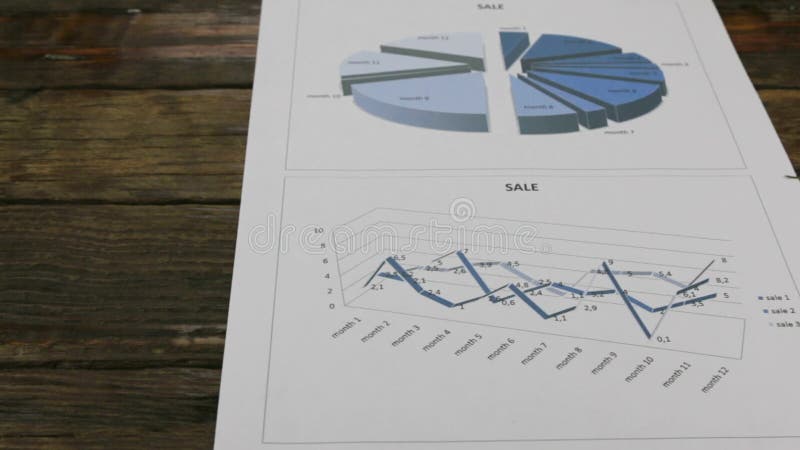 Movement of the Slider Camera. Sheet with Diagrams Lying on a Wooden ...