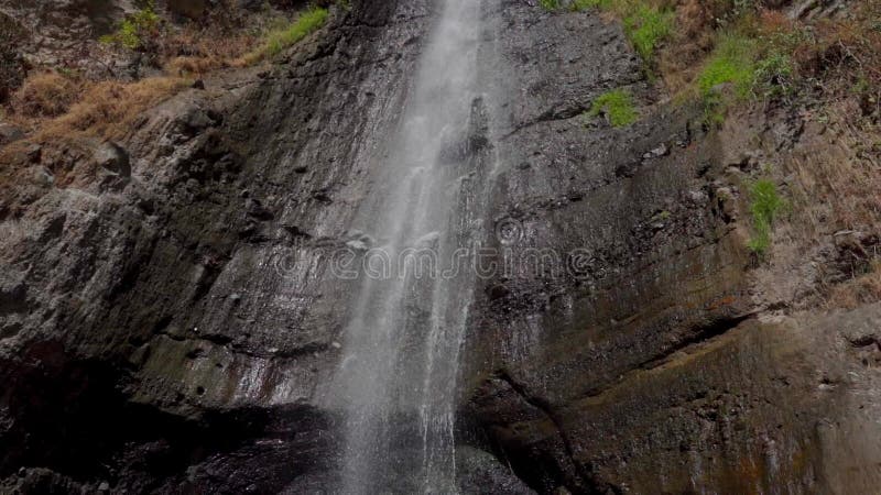 Water Flowing through Waterfall Wall. Stock Footage - Video of descent ...