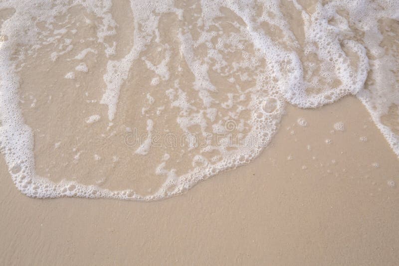 Sea Wave Movement with Feet and Sand. Stock Photo - Image of footprint ...