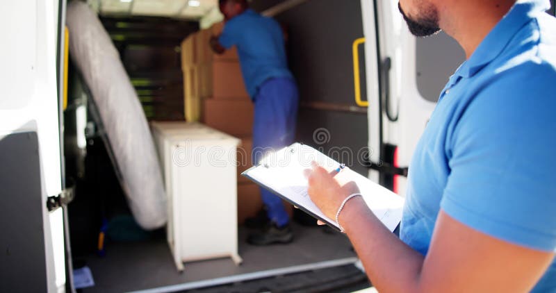 Delivery Man Checking List on Mobile Phone Stock Image - Image of ...