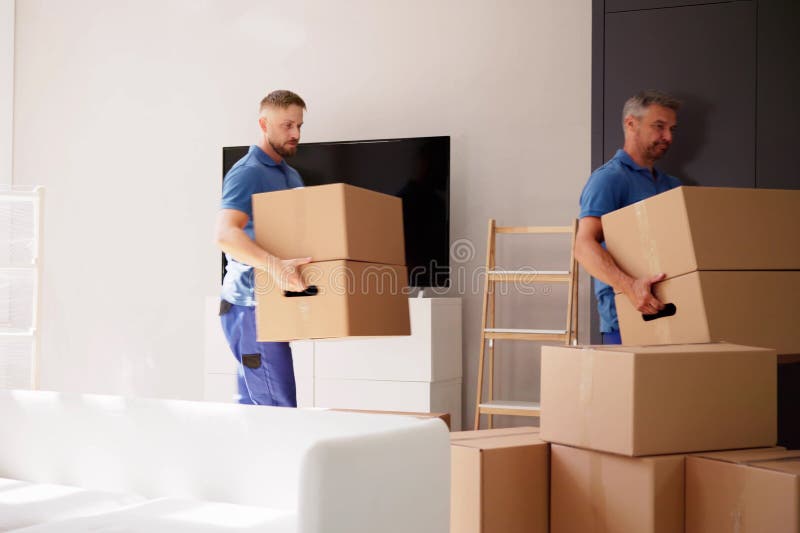Movers Delivering Packaging Boxes Stock Photo - Image of packing ...