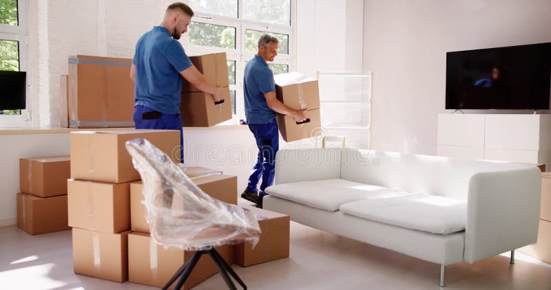 Movers Delivering Packaging Boxes Stock Photo - Image of mature, front ...
