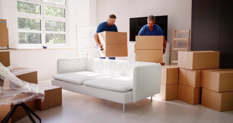 Movers Delivering Packaging Boxes Stock Image - Image of front, mover ...