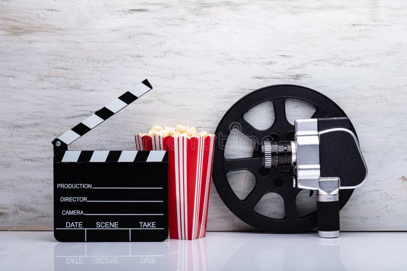 Movie Camera with Popcorn and Clapper Board Stock Image - Image of ...