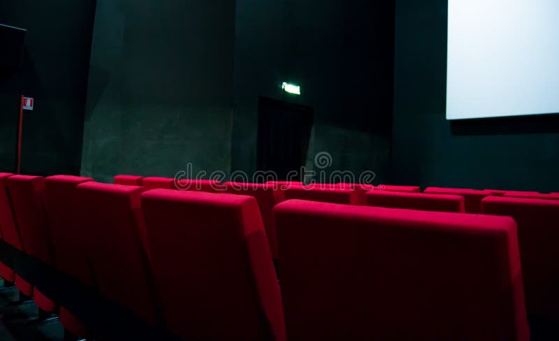 Movie Screen and Red Chairs Inside of a Cinema Stock Photo - Image of ...