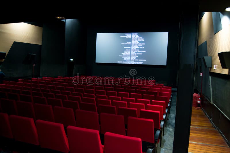 Movie Screen and Red Chairs Inside of a Cinema Stock Image - Image of ...