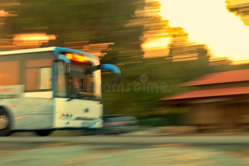 Moving blue bus on a road stock photo. Image of vehicle - 151871340