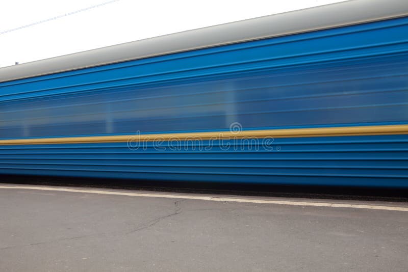 Moving Blue Train at Platform Stock Photo - Image of blurred, lighting ...