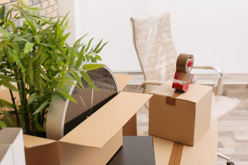 Moving Box with Office Stuff on Table Indoors Stock Image - Image of ...