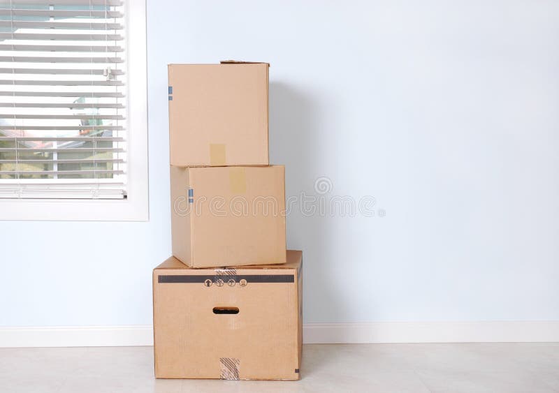 Moving Boxes in Empty Room stock photo. Image of cardboard - 5438550
