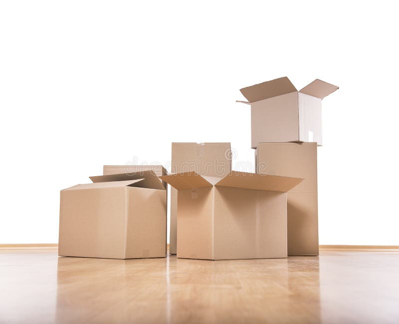 Moving boxes on the floor stock photo. Image of estate - 51589404