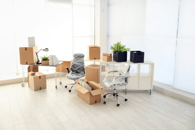 Moving boxes and furniture stock photo. Image of movement - 114513024