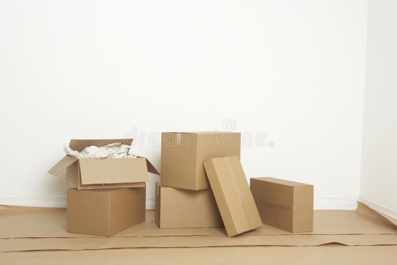 Moving Boxes Inside a Newly Painted Room Stock Photo - Image of wall ...