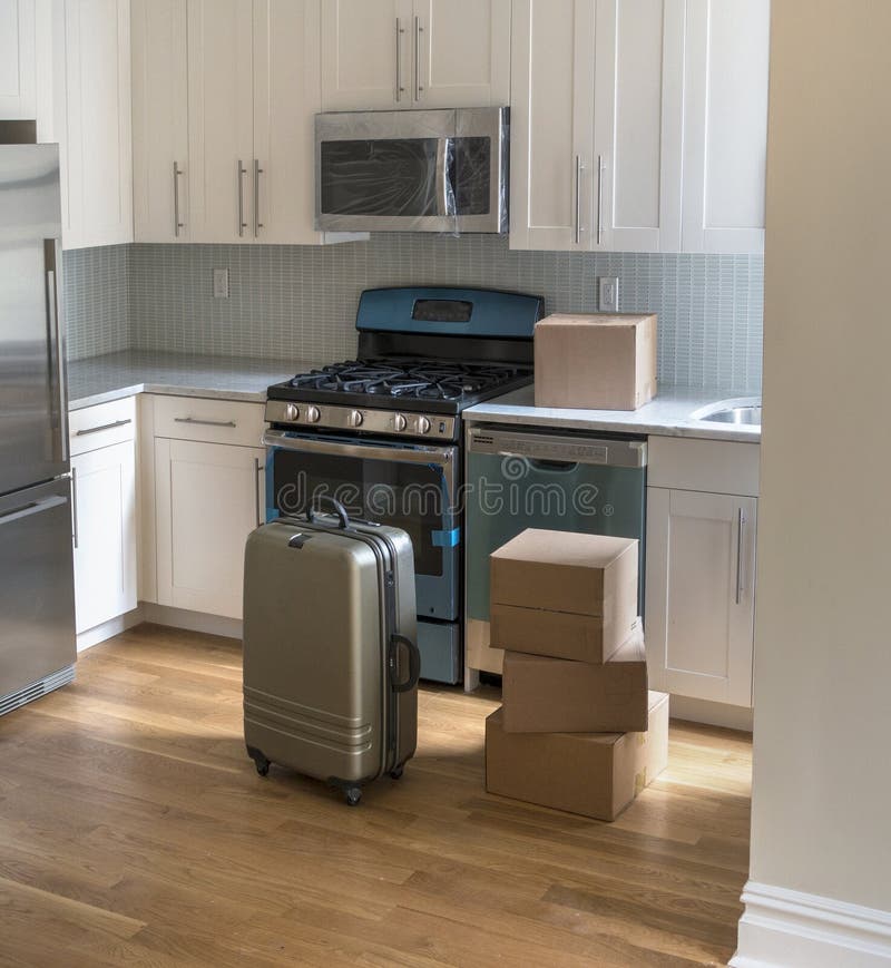 Moving Boxes in New Kitchen Stock Photo - Image of empty, unfurnished ...