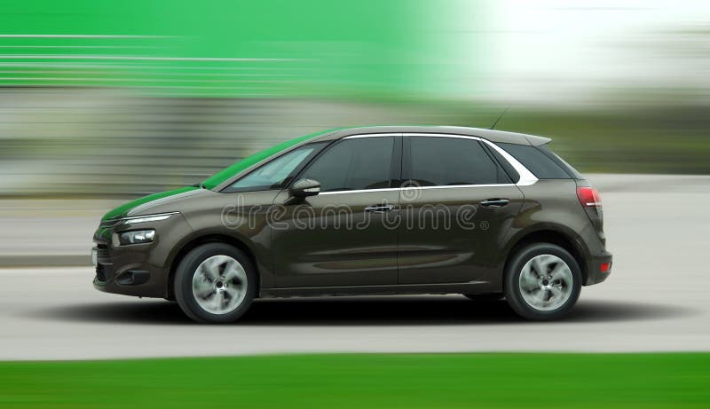 Moving brown car stock image. Image of move, street, movement - 54274425