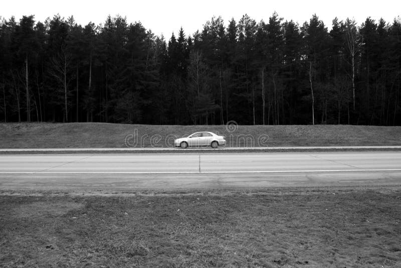 Moving Car on Asphalt Road. Black and White Stock Image - Image of ...