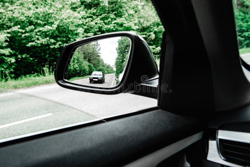 Moving Car in Side Rear-view Mirror of Modern Car. Stock Image - Image ...