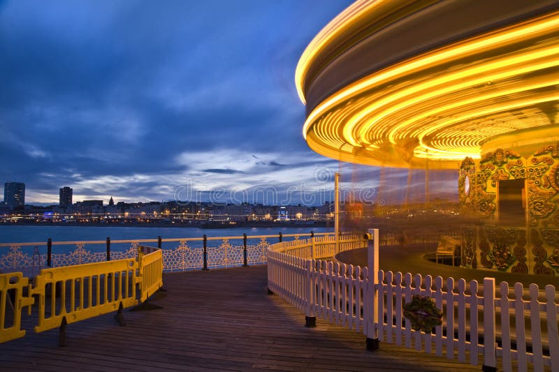 Moving Carousel Carnival Ride at Sunset Stock Image - Image of ride ...
