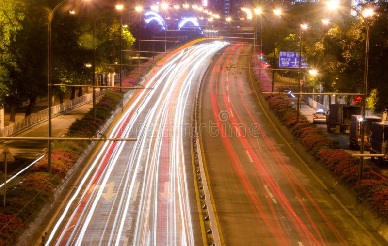 Moving Cars with Fast Blurred Trail of Headlights Stock Photo - Image ...