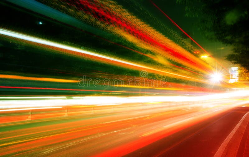 Moving Cars with Fast Blurred Trail of Headlights Stock Photo - Image ...