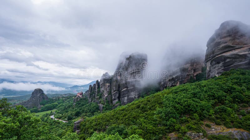 Moving Clouds and Creeping Mists among Cliffs of Meteora Valley Stock ...