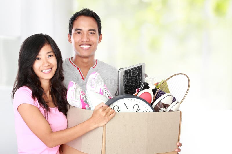 Moving Day. Woman with Her Stuff Inside the Cardboard Box Stock Photo ...