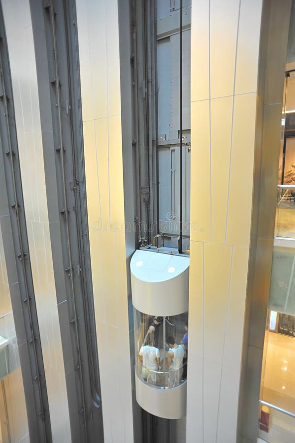 Elevators Moving At The Same Time In Dubai Airport Stock Image - Image ...