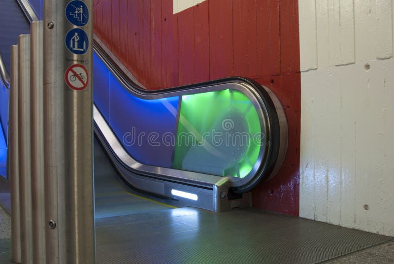 Moving escalator in color stock photo. Image of perspective - 76522740
