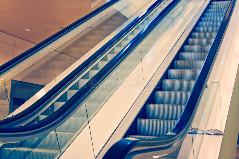 Moving Escalator, Cross Process Stock Photo - Image of move, motion ...
